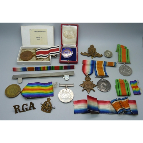 A trio of WWI medals, the Star marked 18581 Gnr. -A.Sjt. --A.C. T.B ...