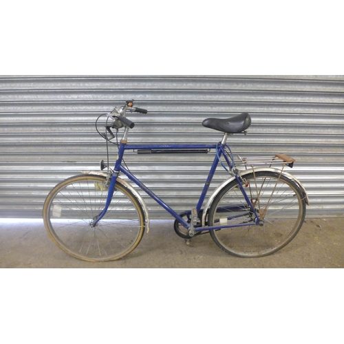 A Vintage Hercules Nottingham Commuter bike and a vintage Raleigh Traveller lady's bike
