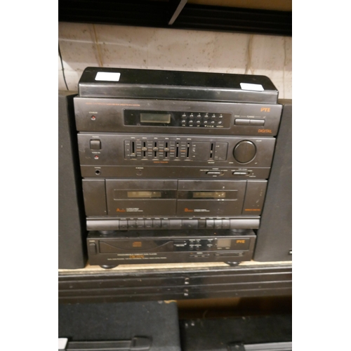 A Pye stereo synthesizer tuner double cassette midi system with a pair ...