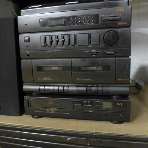 A Pye stereo synthesizer tuner double cassette midi system with a pair ...