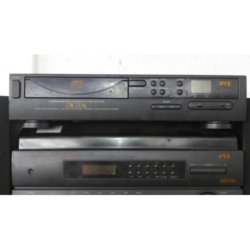 A Pye stereo synthesizer tuner double cassette midi system with a pair ...