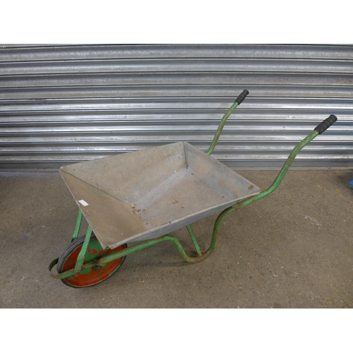 A wheelbarrow, a galvanised watering can, a Flo Pro hose reel and two ...