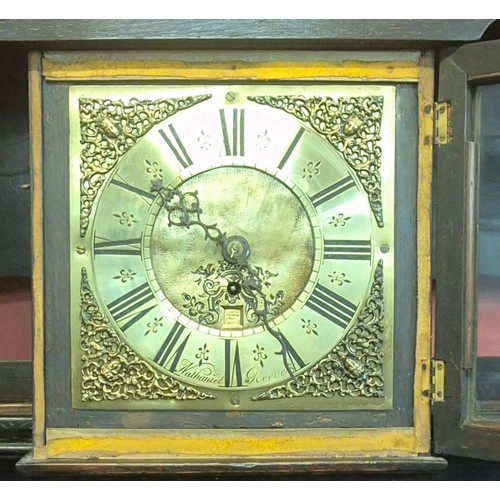 A George III oak dresser, the Delft rack incorporating 30-hour clock ...