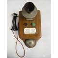 An early signal box telephone with separate mouthpiece and headphone ...