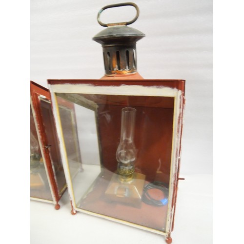 A pair of LMS/LNWR station platform lamps with reservoirs and glass ...