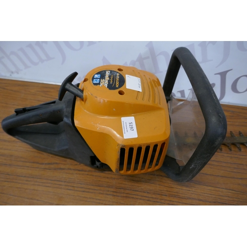 A Ryobi RHT2660DA petrol driven hedge trimmer and a McCulloch Gladiator ...
