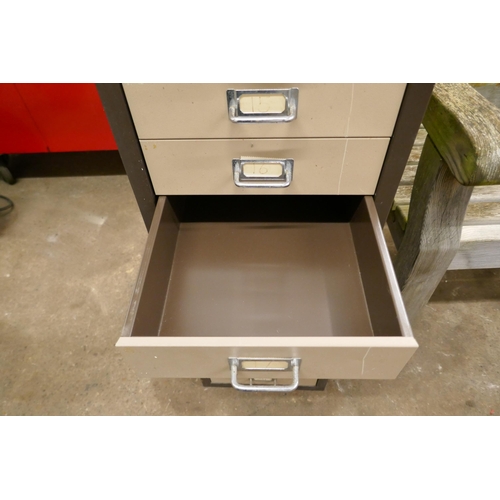 A 12 drawer metal multi-drawer filing cabinet