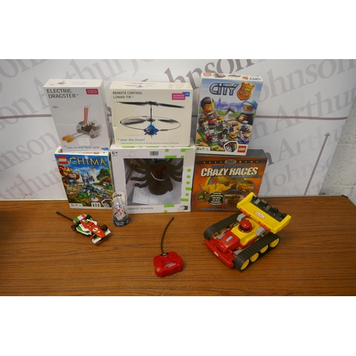 A quantity of toys and board games including LEGO City Alarm, LEGO ...