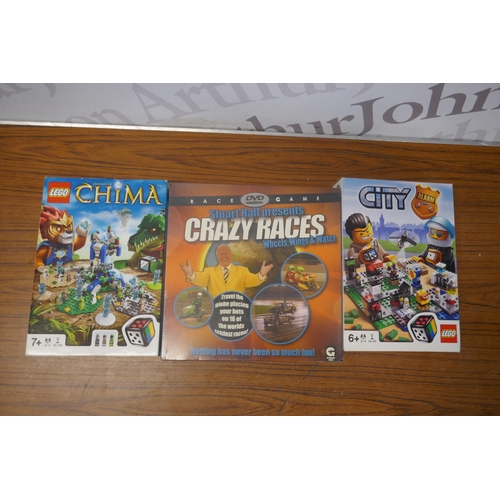 A quantity of toys and board games including LEGO City Alarm, LEGO ...