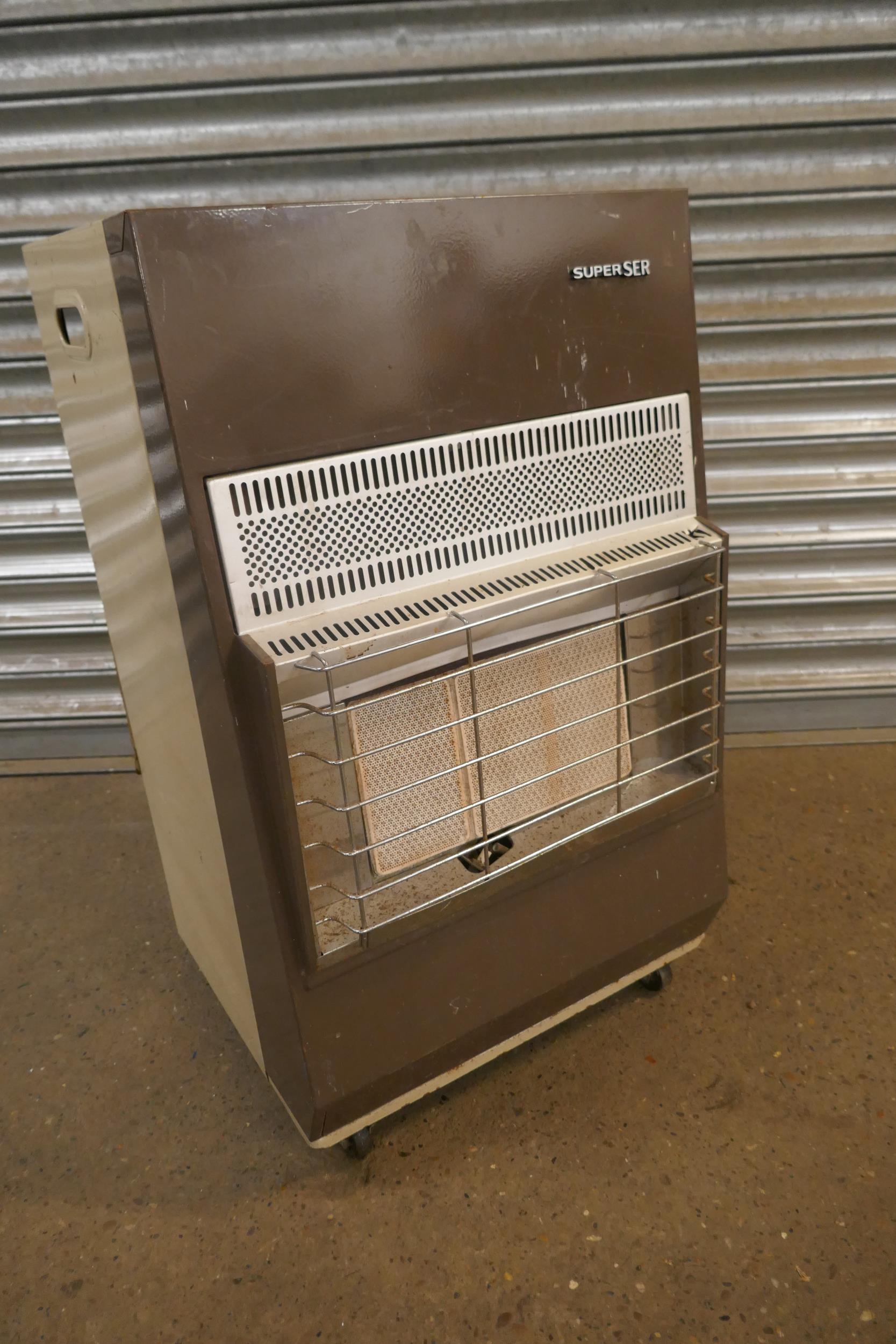 A Calor Gas fire with gas bottle