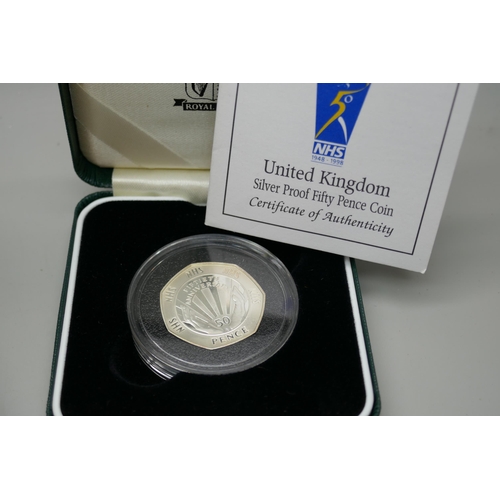 A silver proof NHS 50p with certificate, and the UK's rarest decimal ...