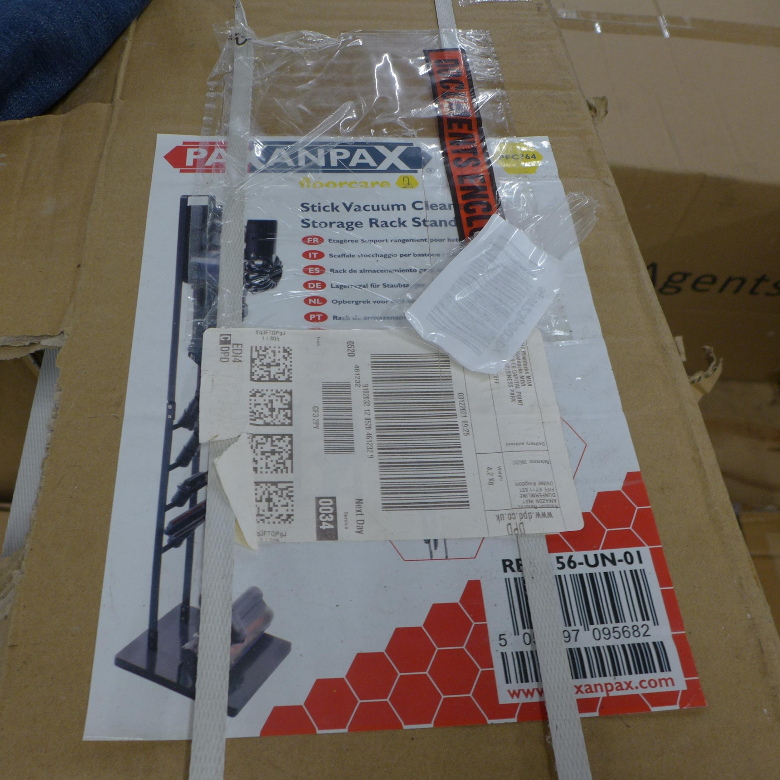 Six boxed Paxanpax stick vacuum cleaner storage rack stands