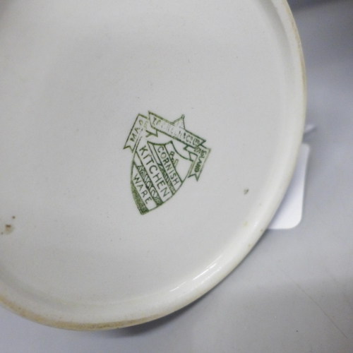 A T.G. Green 'milk' jug and one other jug and a Pyrex glass rolling pin