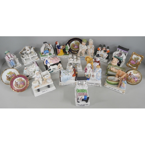 A collection of porcelain, Limoges plates and seventeen figures to ...