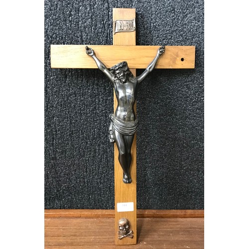 A French silver effect and wooden crucifix