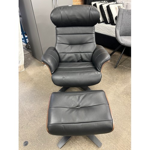 Kuka Karma black leather reclining arm chair with footstool, original ...
