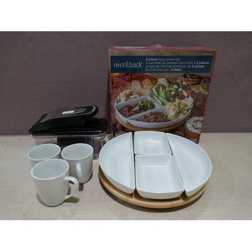 Bamboo Lazy Susan with porcelain dishes, Miu vegetable chopper and ...