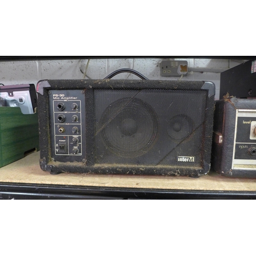 A quantity of stereo equipment including an Inter-M PS-30 Mic amplifier, a Maine solid state amplifi
