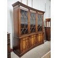 A Regency style mahogany concave bookcase