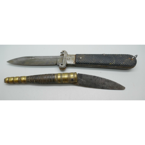 Two pocket knives, one with cartridge extractor fitting *This lot is ...