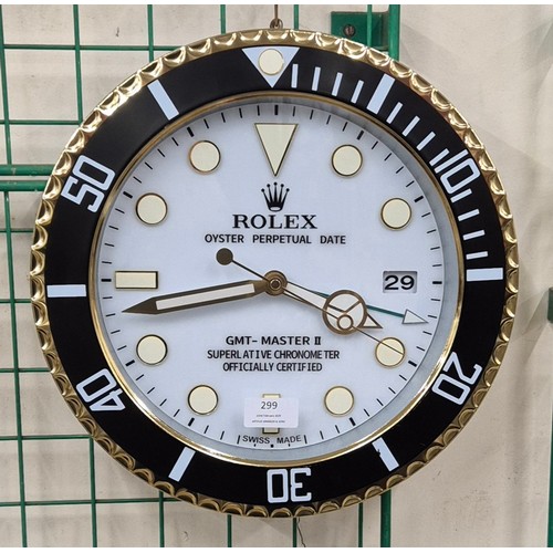 A Rolex style dealers display wall clock