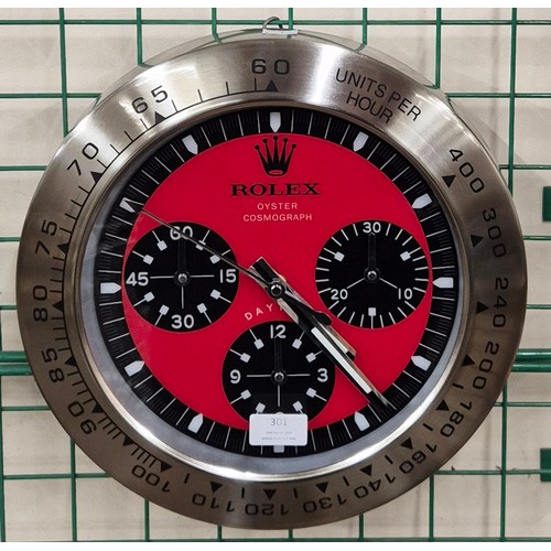 A Rolex style dealers display wall clock