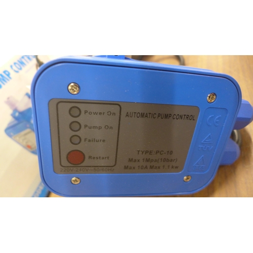 A Clarke pump EPC800 electronic pump control unit and a model PC-10 automatic pump control unit * Th