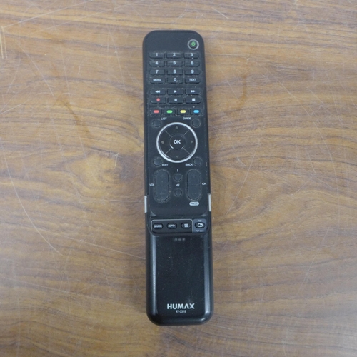 A Humax PVR-9300T Freeview box with remote