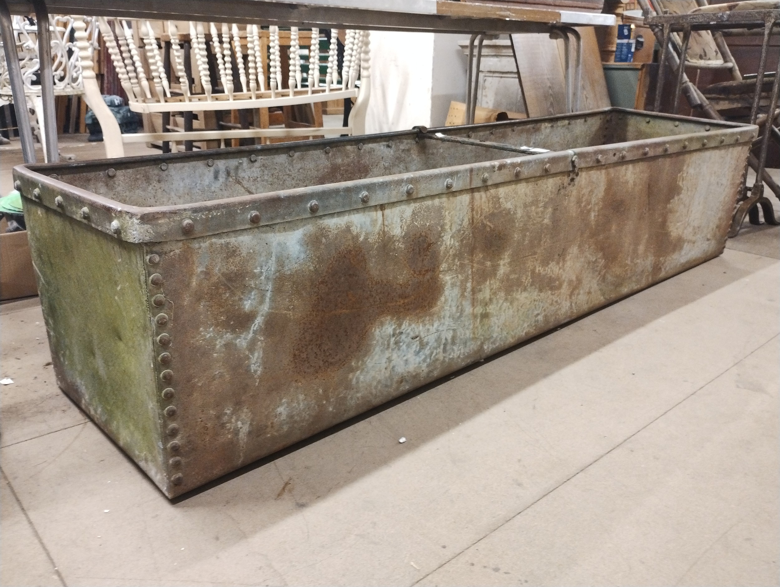 A large galvanised watering trough