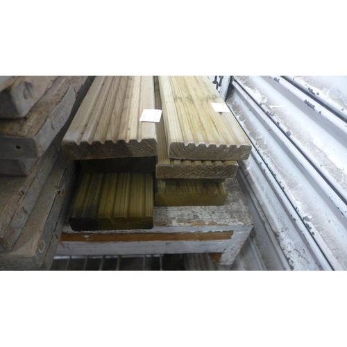 Eight lengths of timber decking in various lengths and profiles
