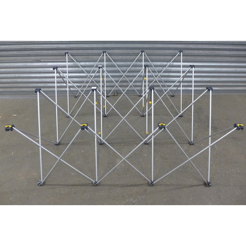 A portable light-weight folding square stage riser