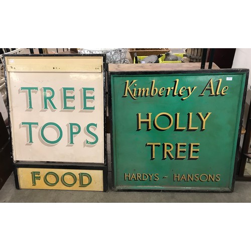 Two painted wooden pub signs; Holly Tree and Tree Tops