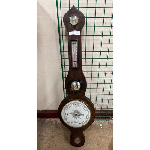 A Victorian walnut aneroid barometer, signed J.J Lockwood, Preston