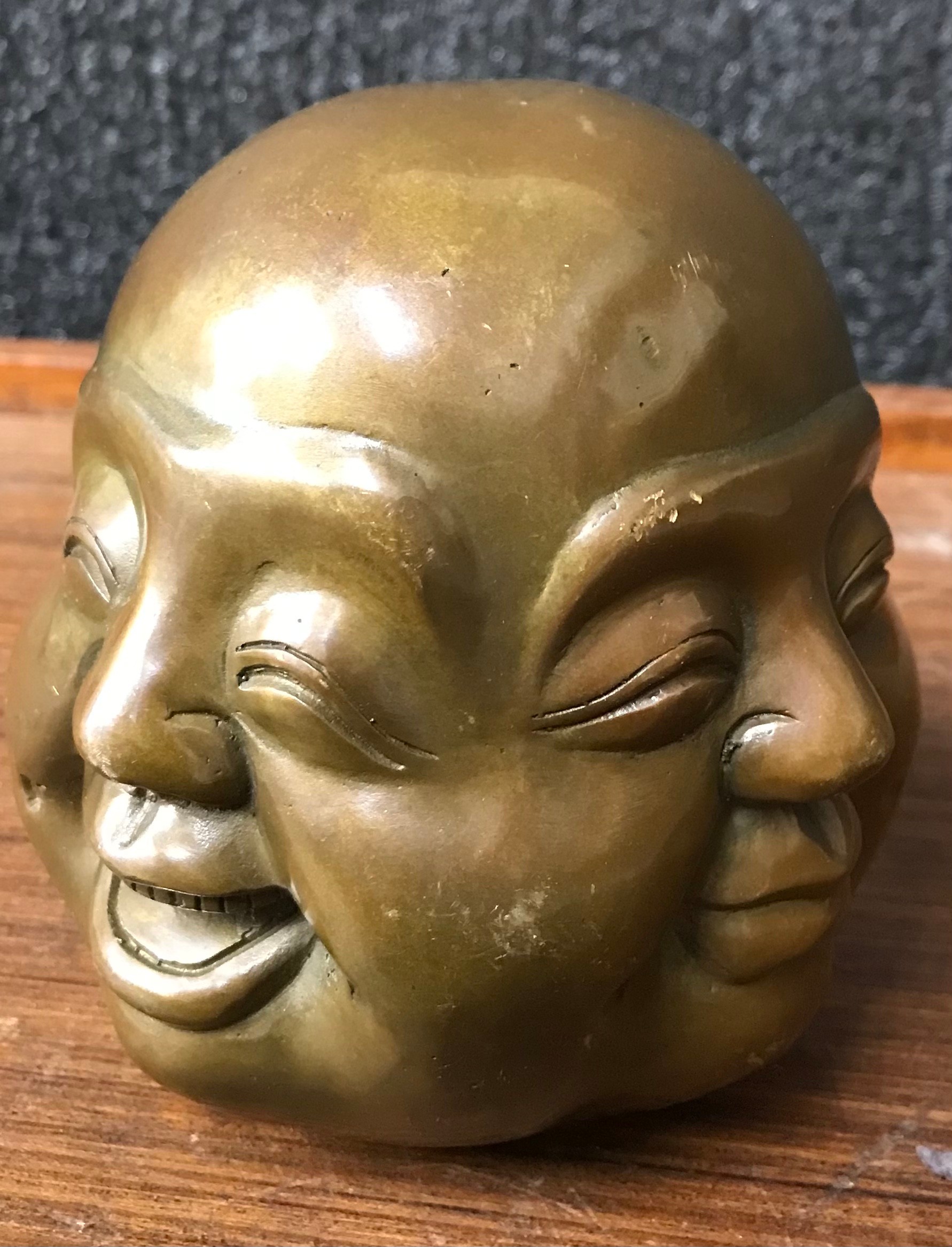 A Chinese bronze four faced Buddha