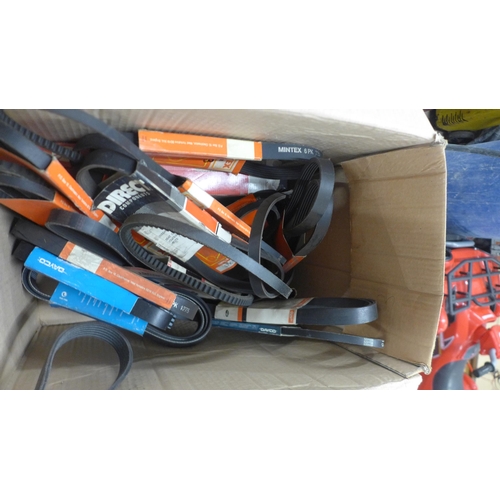 A large quantity of assorted car drive belts