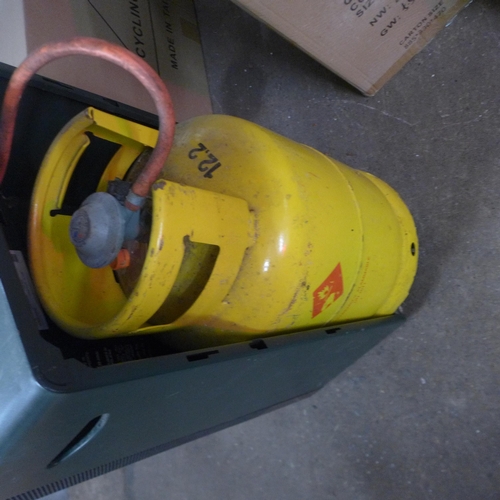 A Helius Superser gas heater with empty gas bottle