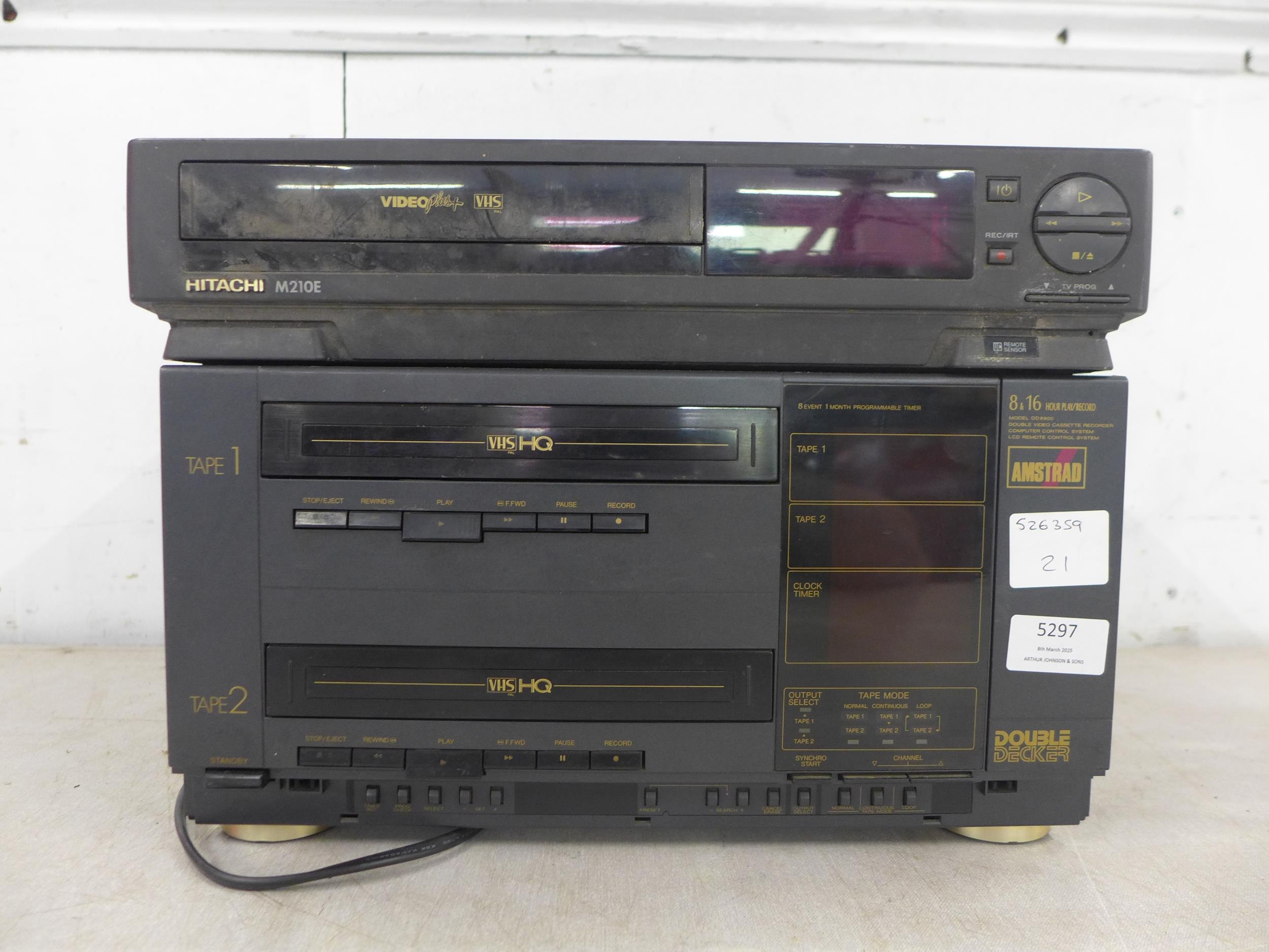 An Amstrad double decker VHS player and Hitachi VHS player