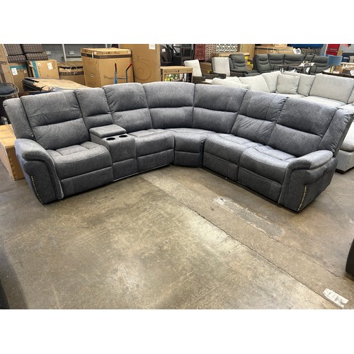 A Berlin electric reclining corner sofa with drink holder, USB ports ...