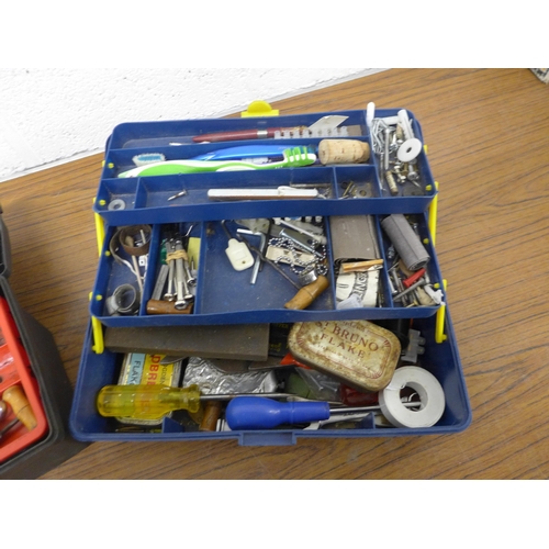 Two tool boxes and a quantity of tools and wood saws
