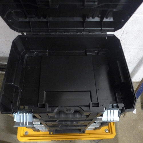 A set of 4 stacking DeWalt toolboxes on DeWalt dolly wheels