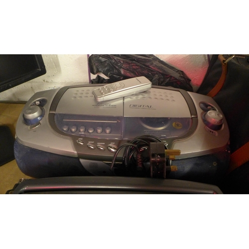 A Goodmans portable CD player and a JVC portable CD player