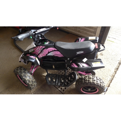 A XTM Monster pink and black electric midi quad *This lot is a Police ...
