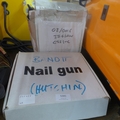 A boxed sample Clarke Air Bandit and nail gun with a quantity of nails ...