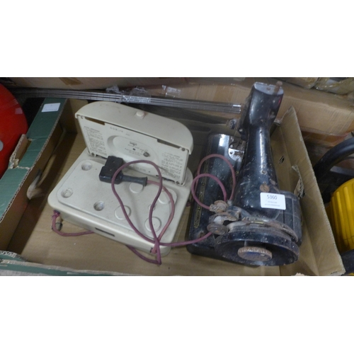 A vintage Singer electric sewing machine and a vintage Goblin teasmaid