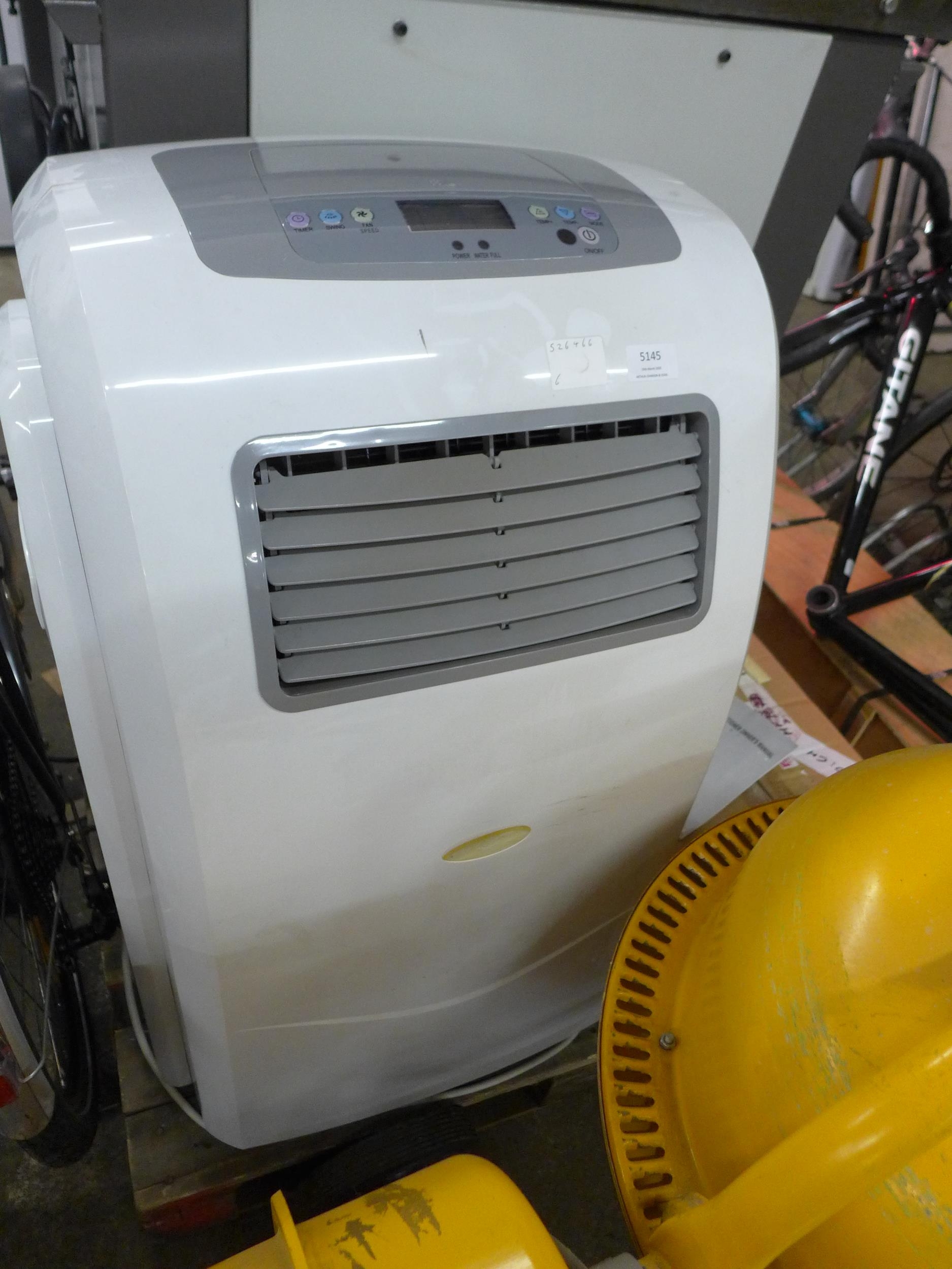 A sample model KY-32/X1C mobile air conditioner *This lot is subject to VAT