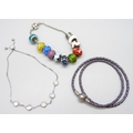 A Pandora silver mounted leather bracelet, a Rhona Sutton silver ...