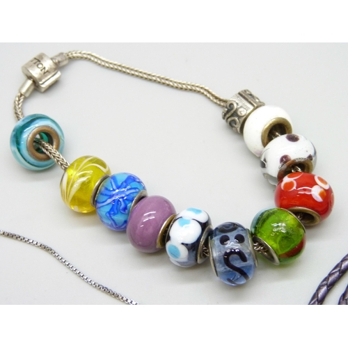A Pandora silver mounted leather bracelet, a Rhona Sutton silver ...