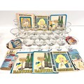 A collection of twenty one Babycham glasses, Babycham mats and one ...