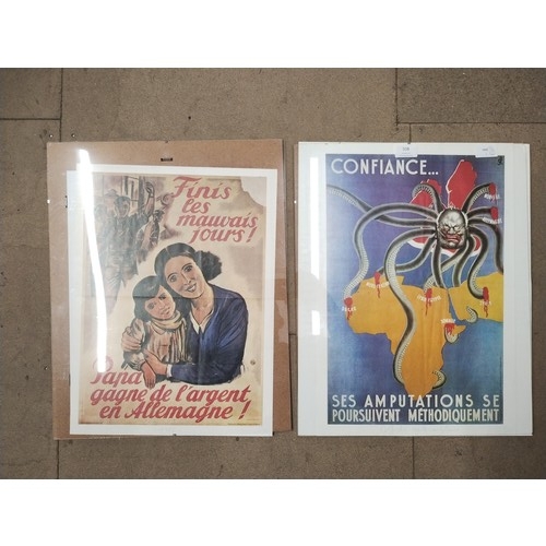 Two WWII French/German propaganda poster prints, in clips frames