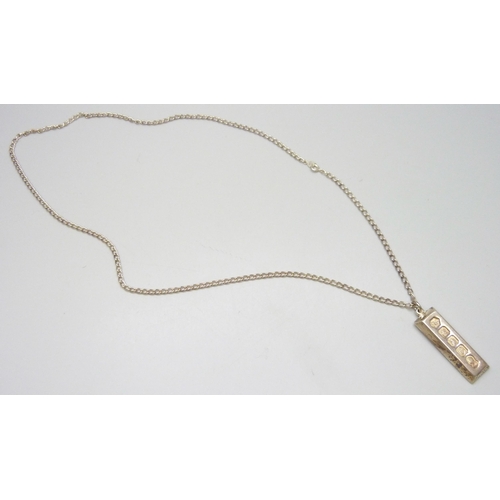 A silver ingot on a silver chain, 41g